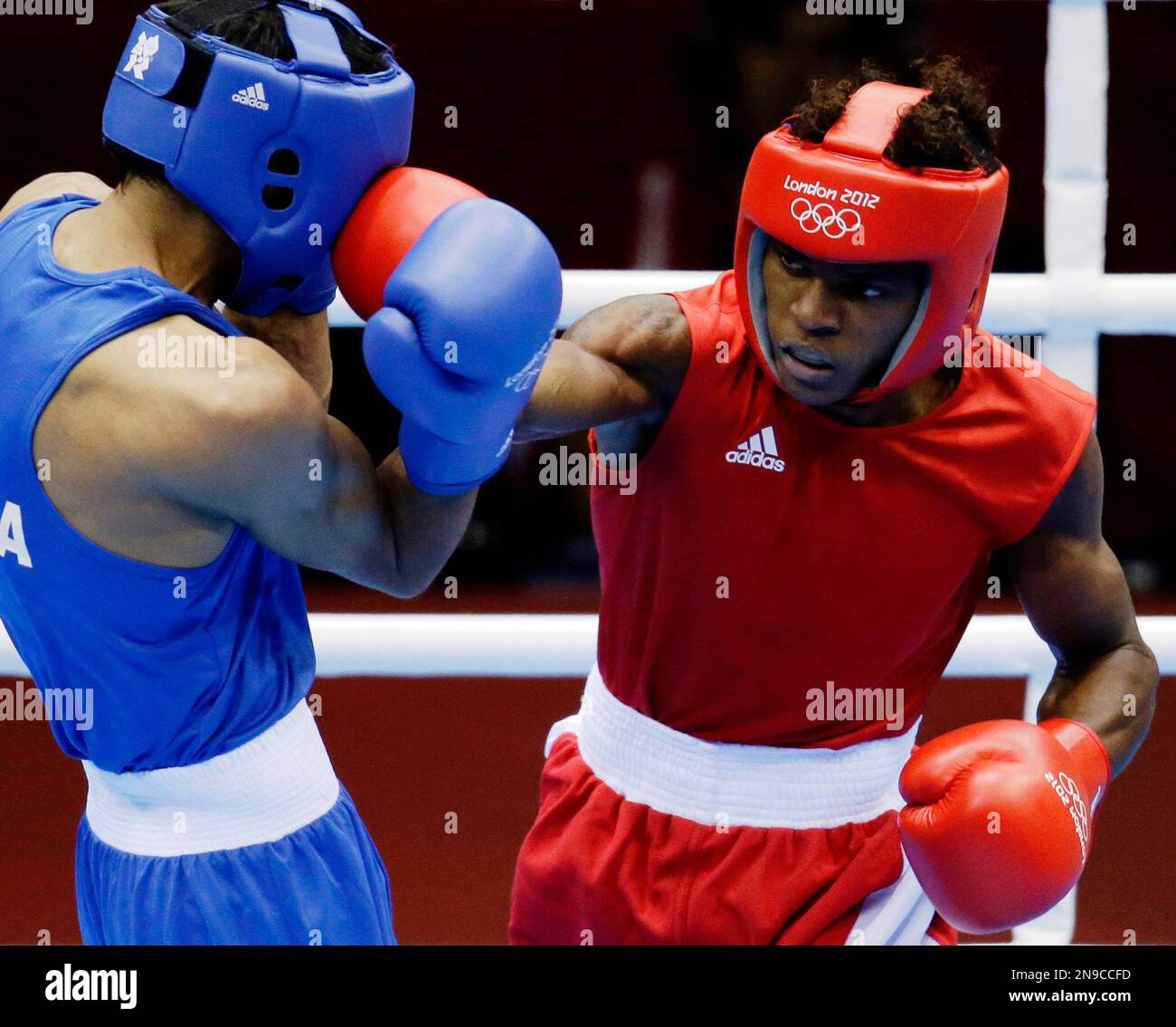 Andrique Allisop of the Seychelles, right, connects with India's ...