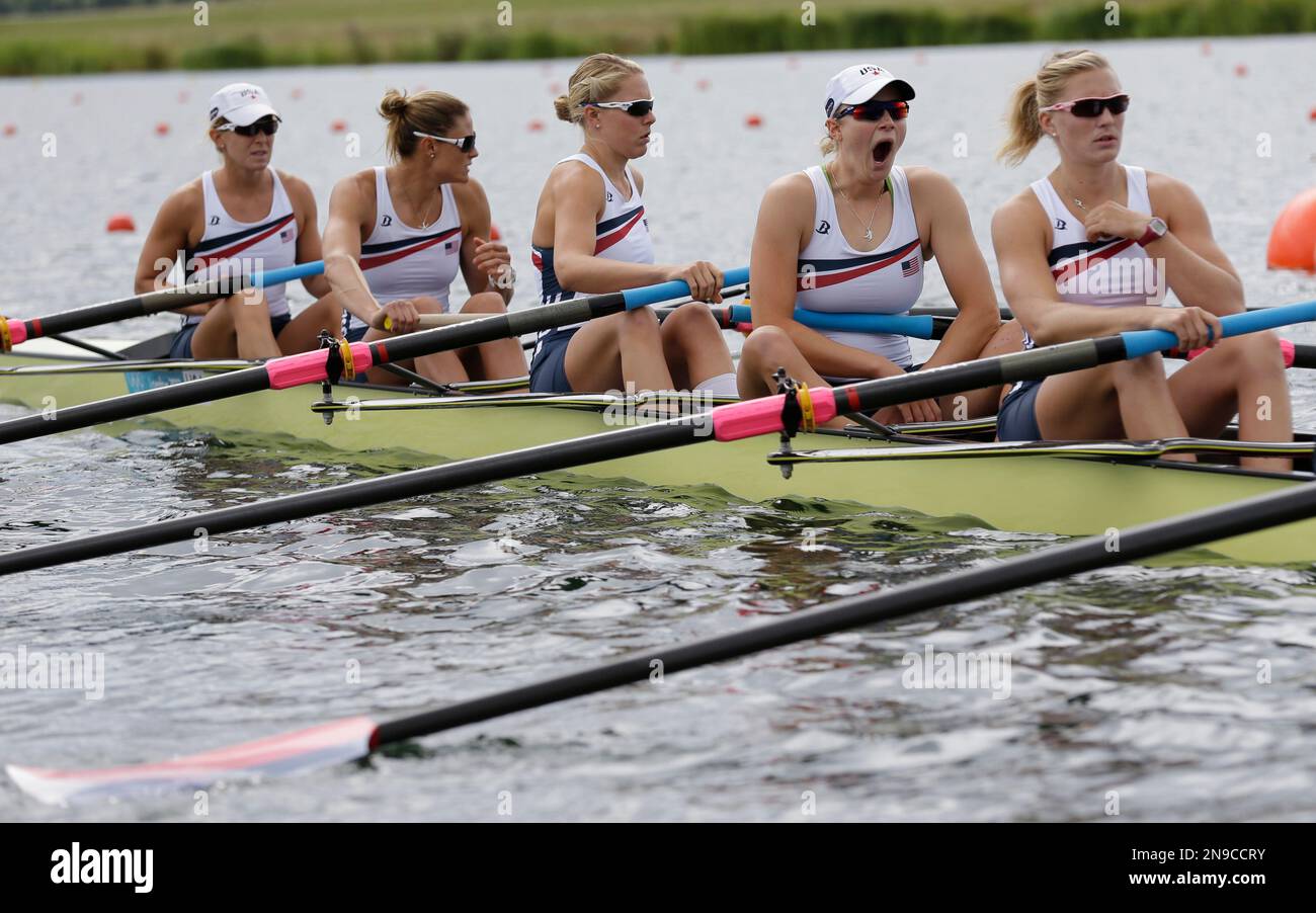 Taylor Ritzel, second from right, yaws, as she waits with teammates of ...
