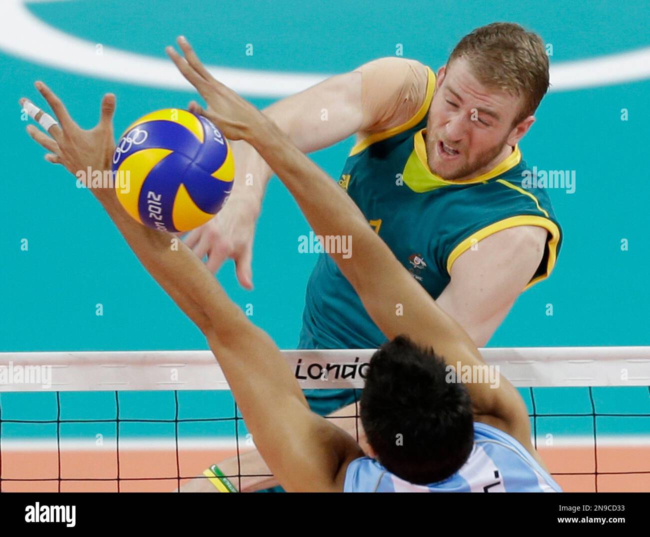 Australia's Harrison Peacock (7) spikes the ball past Argentina's ...