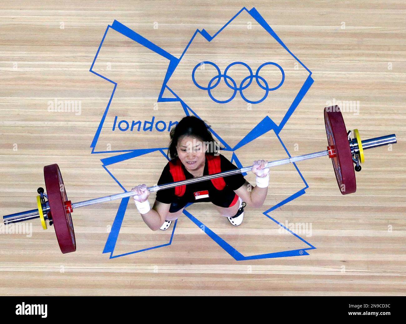 Singapore's Helena Wong competes during the women's 53-kg, group B ...