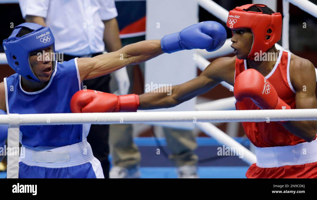 Colombia's Eduar Marriaga Campo lands a punch against Wellington Arias ...