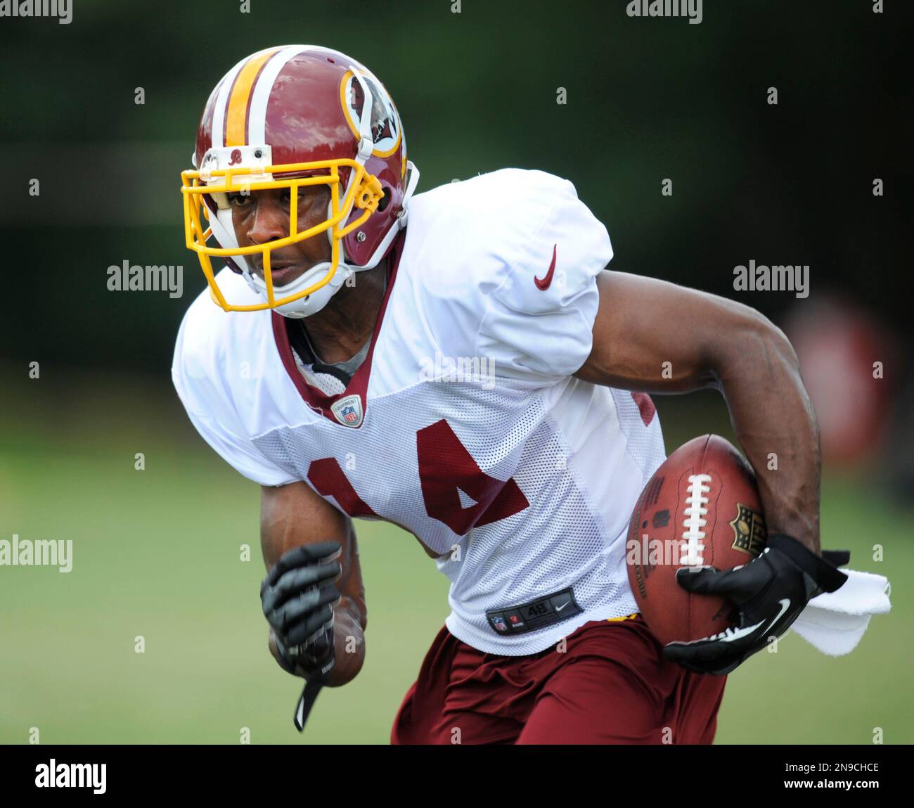 Washington Redskins wide receiver Samuel Kirkland runs with the ball ...