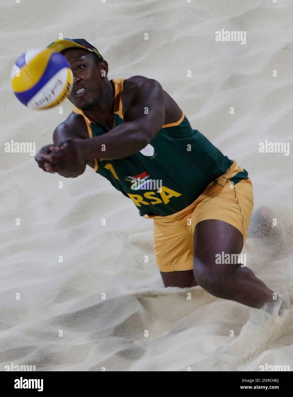 Republic of South Africa's Freedom Chiya digs out a spiked a ball ...
