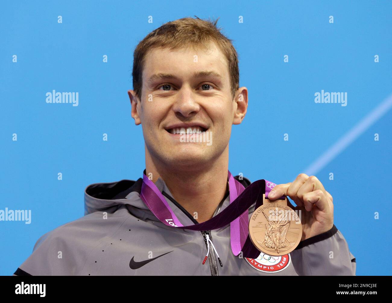 United States' Peter Vanderkaay poses with his bronze medal for the men ...