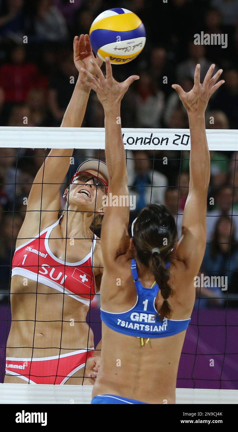 Maria Tsiartsiani, right, from Greece tries to block Simone Kuhn, left ...