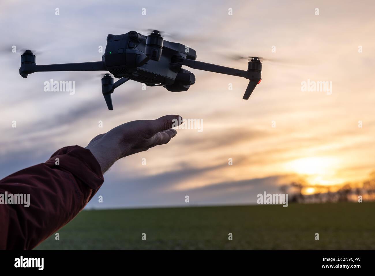 Pilot launch drone from hand hi-res stock photography and images - Alamy