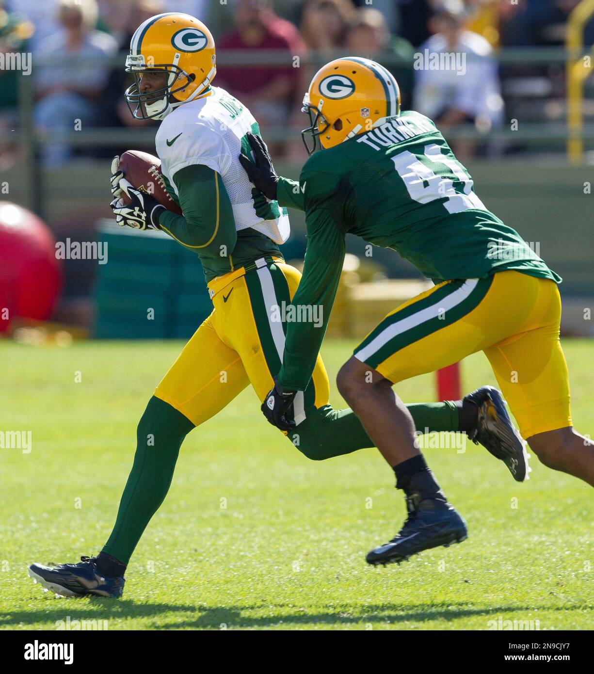 Green Bay Packers defensive back Dion Turner (41) tries to defend wide ...