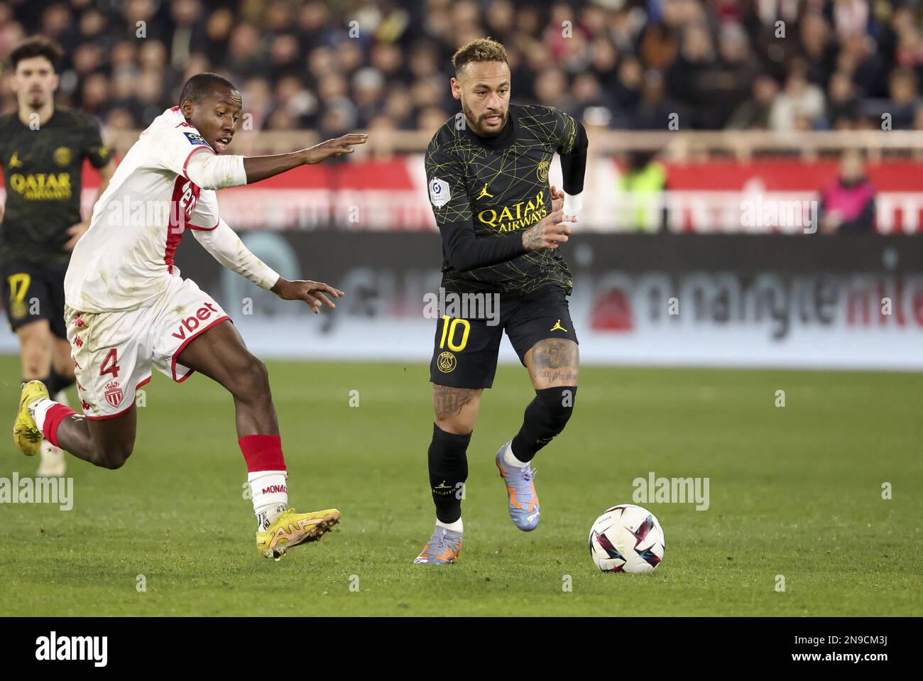 Neymar Jr of PSG, Mohamed Camara of Monaco (left) during the French ...