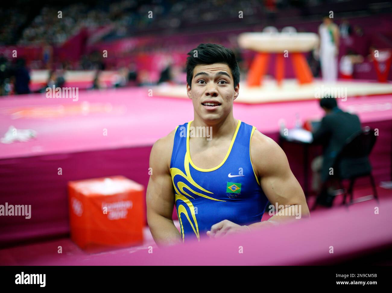 Brazilian gymnast Sergio Sasaki Junior walks after performing during ...