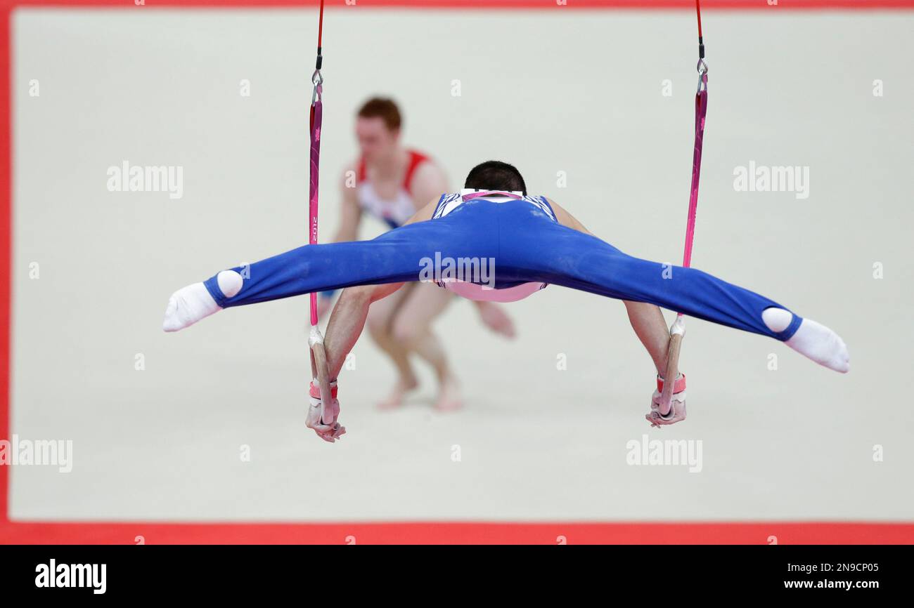 Gymnast Hamilton Sabot from France performs on the rings, as Great ...