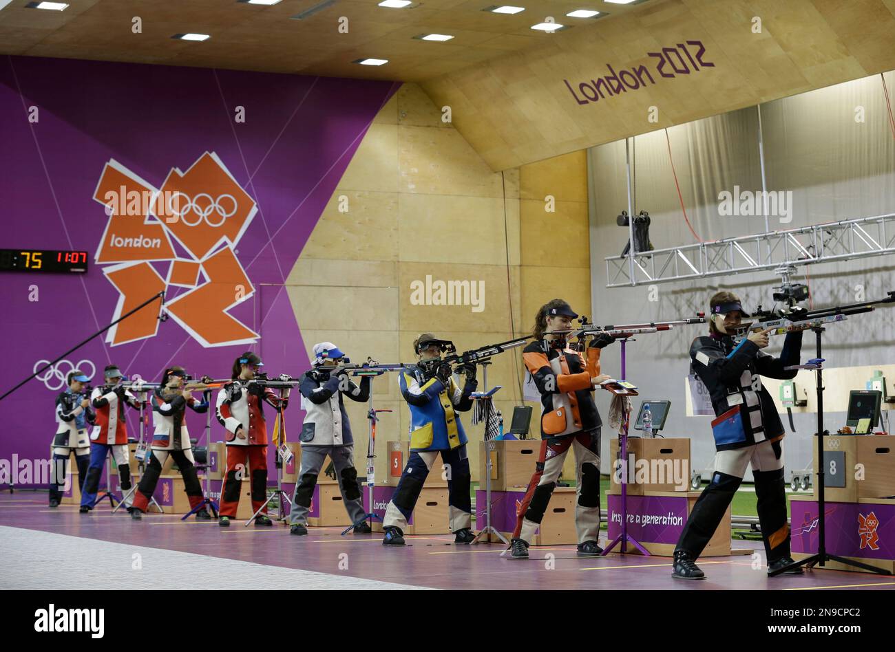 The eight finalists prepare for the start of the women's 10-meter air ...
