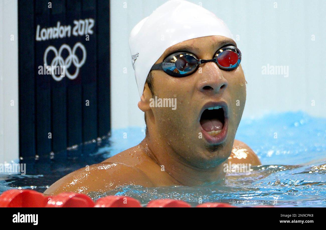 United Arab Emirates' Mubarak al-Besher reacts after swimming a men's ...