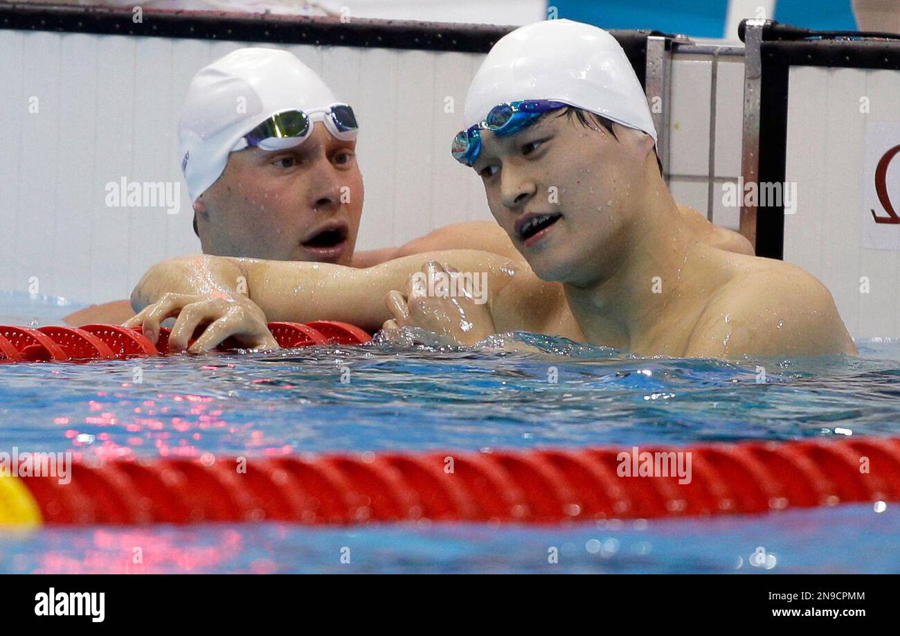 China's Sun Yang, right, and Unites States' Peter Vanderkaay react ...