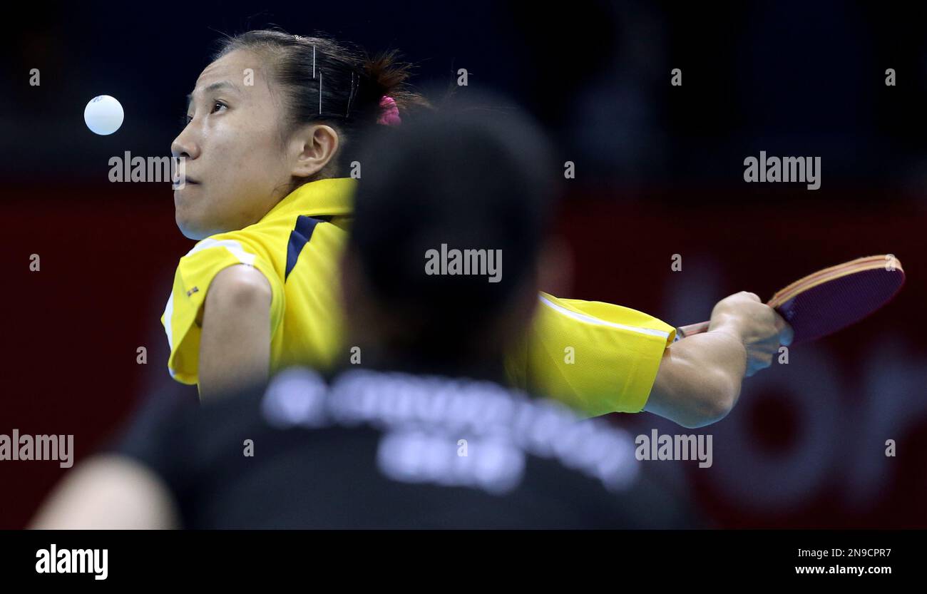 Congo's Xing Han serves against Belarus' Aleksandra Privalova during a ...