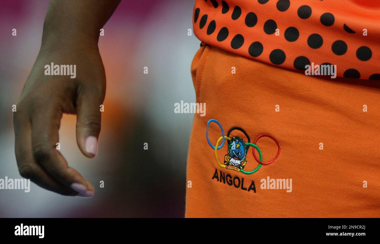 The Olympic rings are embroidered on the pants of Angola's goalkeeper ...