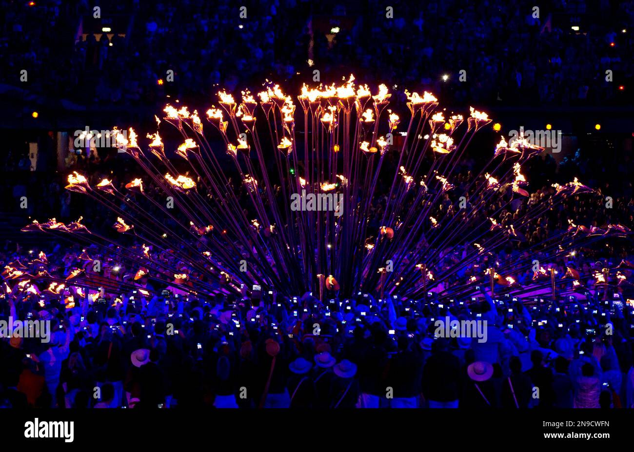The Olympic cauldron is lit during the opening ceremonies for the 2012 ...