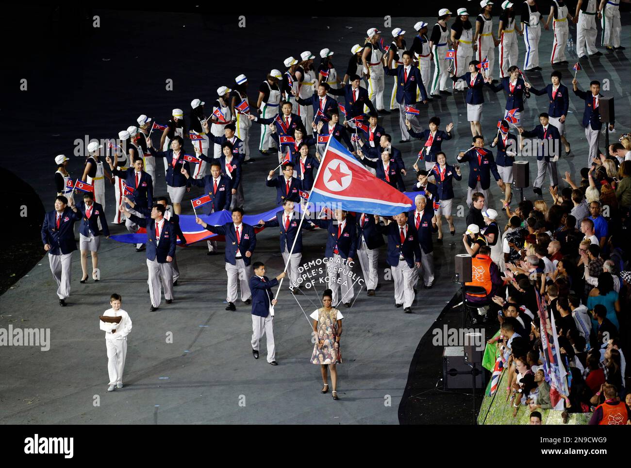 North Korea's Pak Song Chol carries the flag during the Opening ...