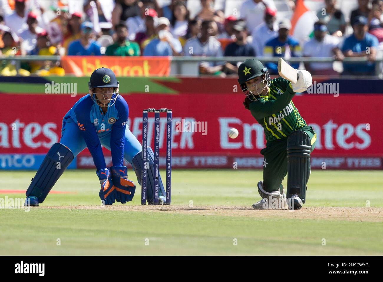 Pakistan's Sidra Amin, right, plays a shot while Indian wicketkeeper ...
