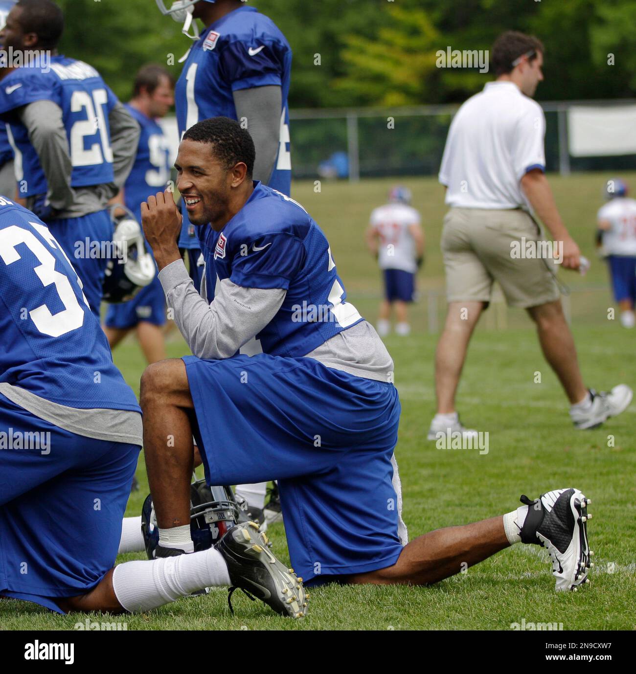 New York Giants defensive back Terrell Thomas center, kneels on the ...
