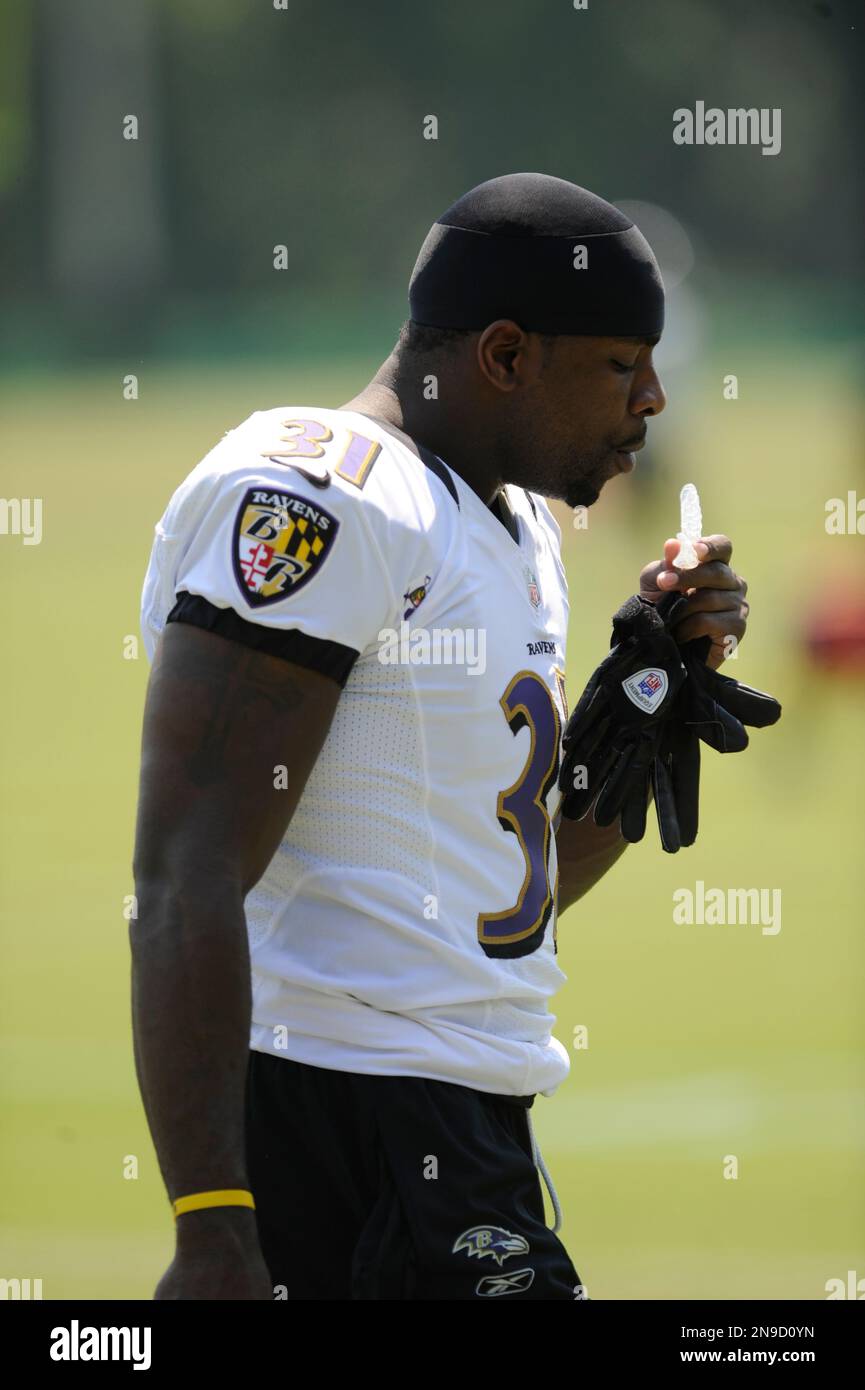 Baltimore Ravens Bernard Pollard blows on his mouth guard during NFL ...