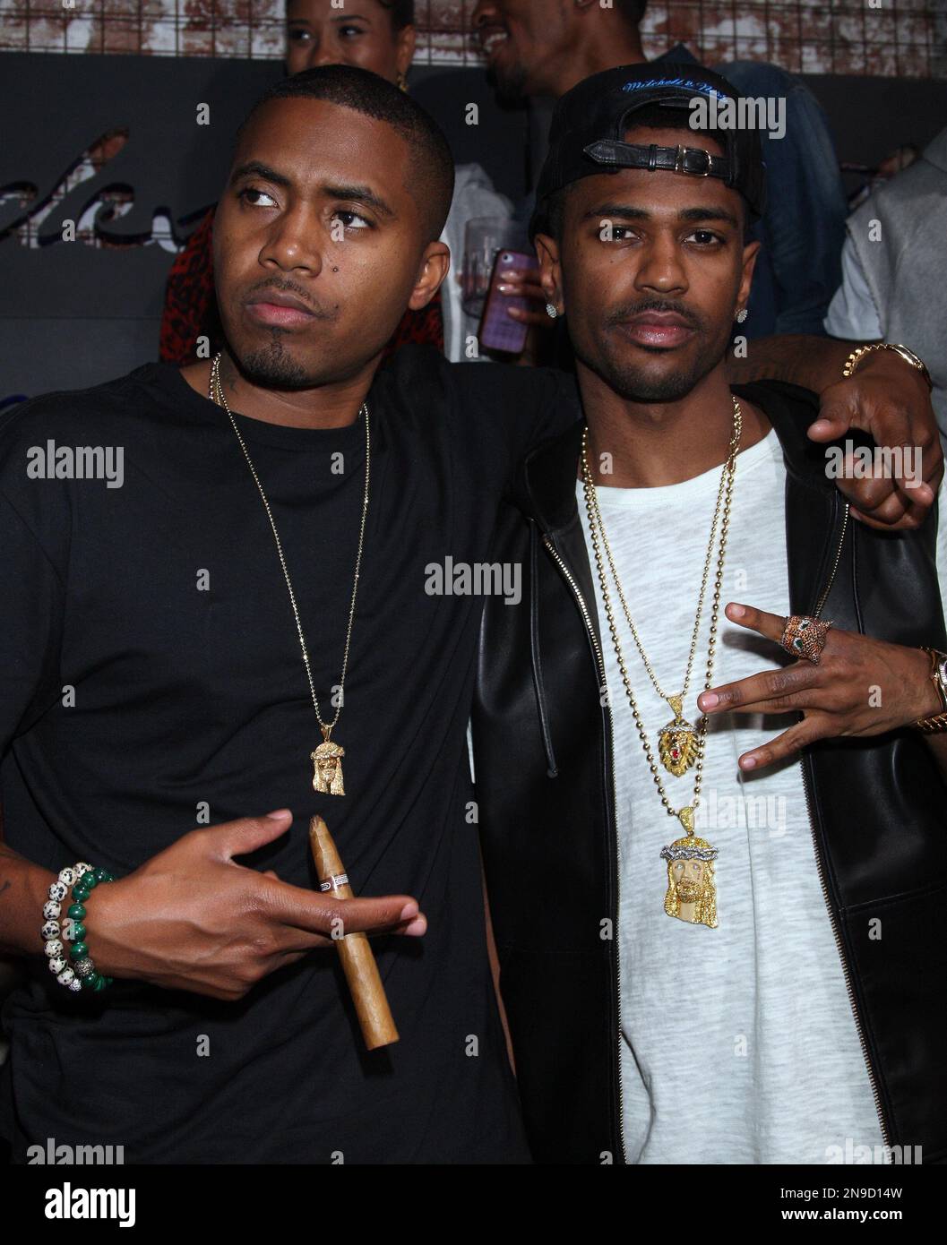 Rappers Nasir Bin Olu Dara Jones, aka Nas and Big Sean pose at Jimmie ...