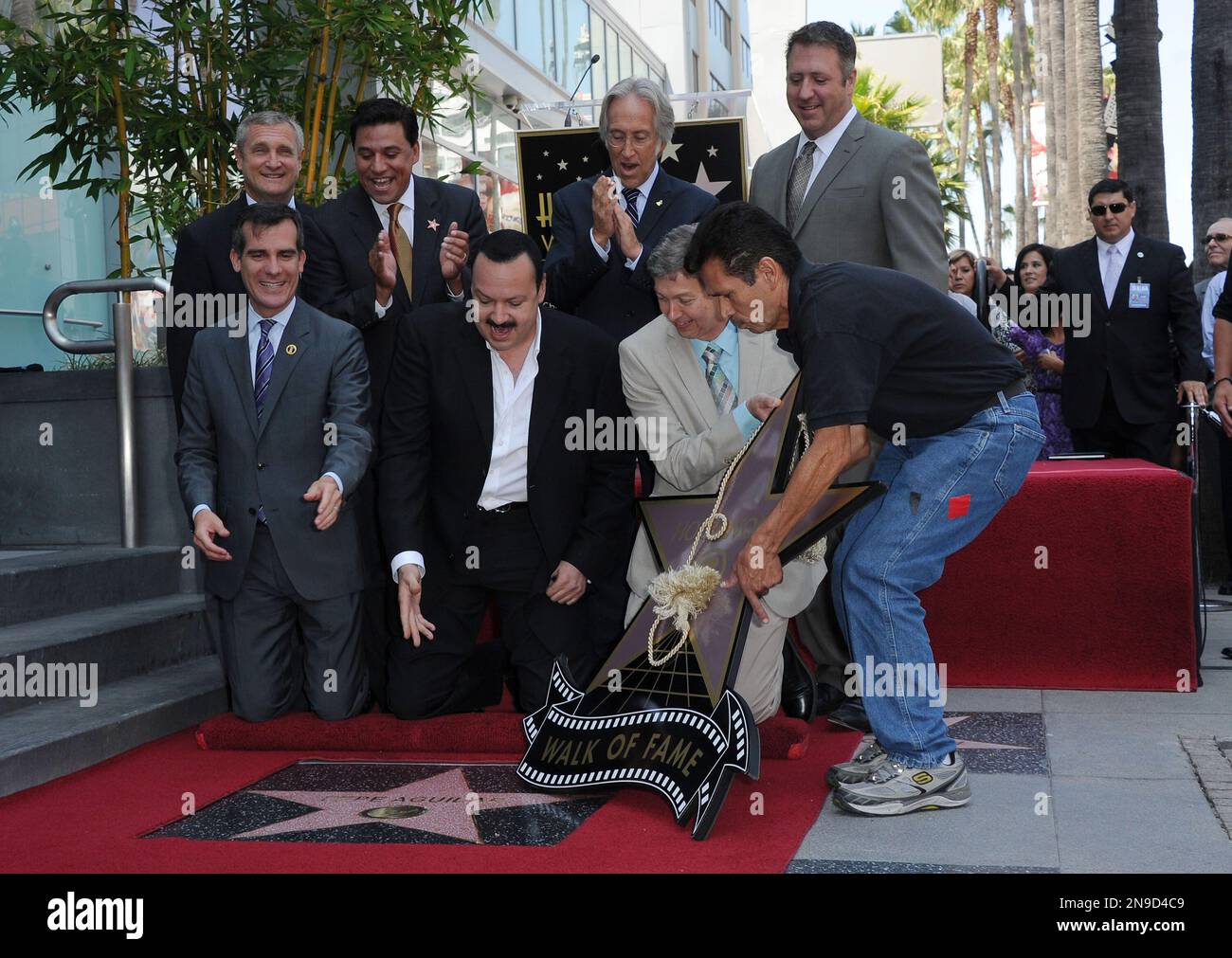 Latin singer Pepe Aguilar, at center, poses with his new star on the ...