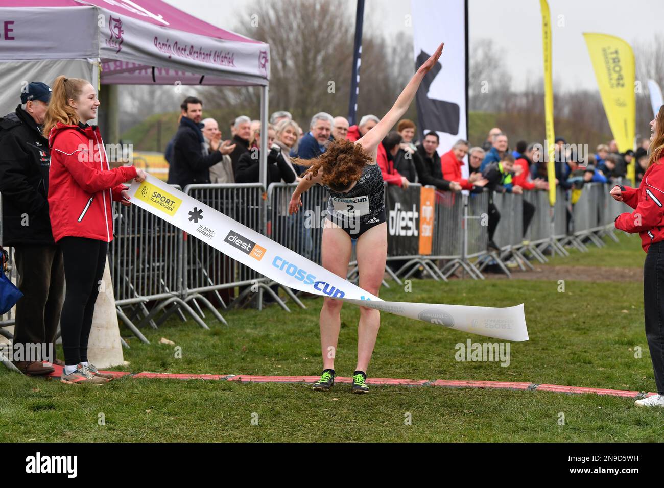 Belgian Lisa Rooms celebrates as she crosses the finish line to win the ...