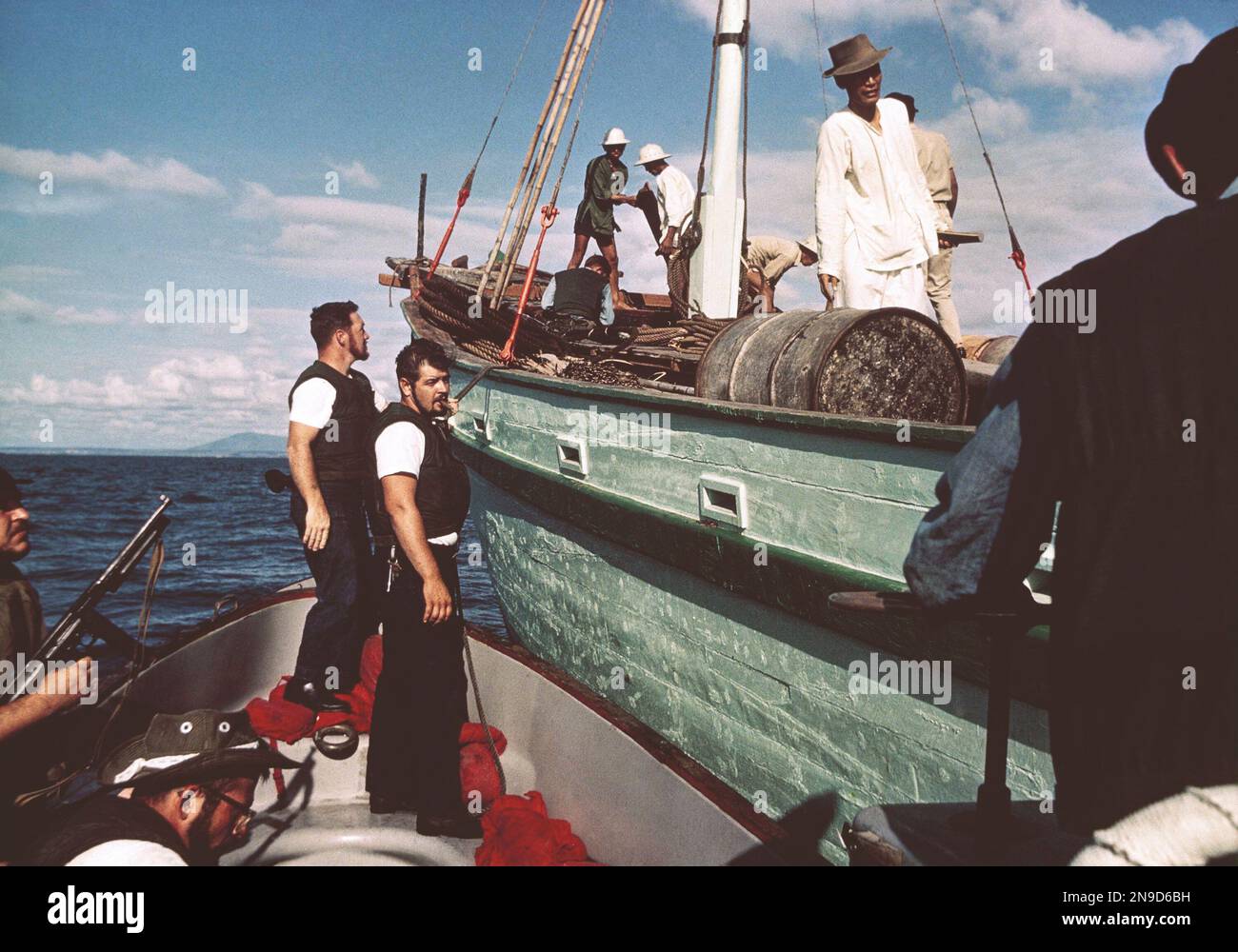 Crewmembers of fishing junk warn U.S. Navy inspection teams in Vietnam ...