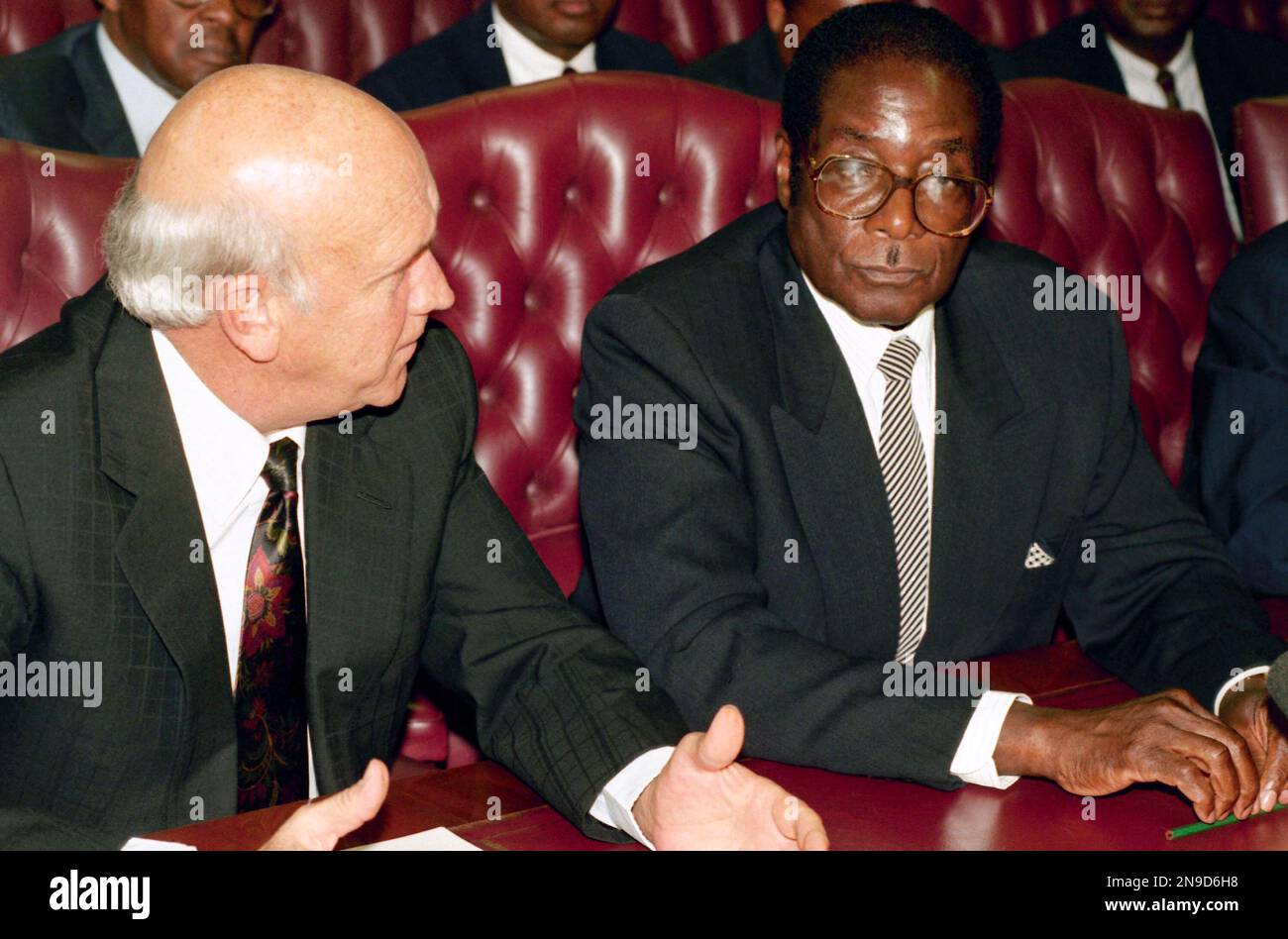 South African President F. W. de Klerk, left, and his Zimbabwean counterpart President Robert ...