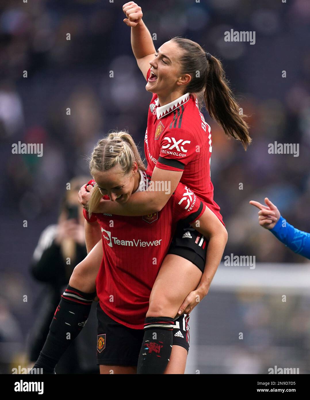 Manchester United's Vilde Boe Risa celebrates by jumping on the back of ...
