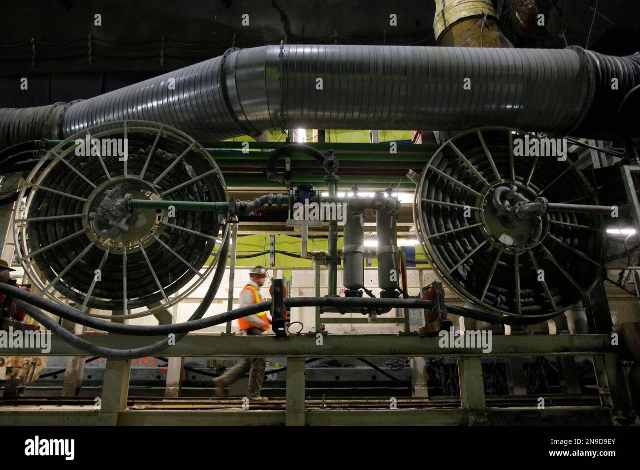 FILE - In this Feb. 3, 2010 file photo, a sand hog works inside the ...