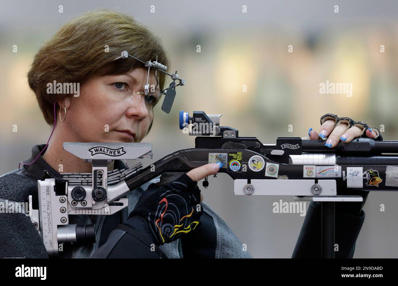 Kazakhstan's Olga Dovgun trains for the 10-meter air rifle event at the ...