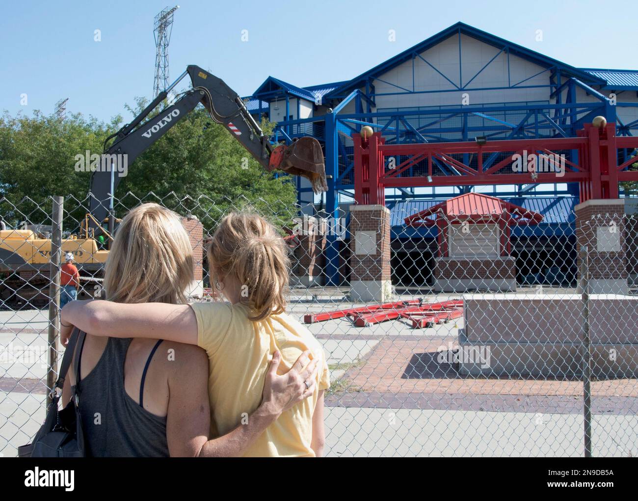 Omaha residents Mary Dilley and her daughter Jesse May watch as heavy ...