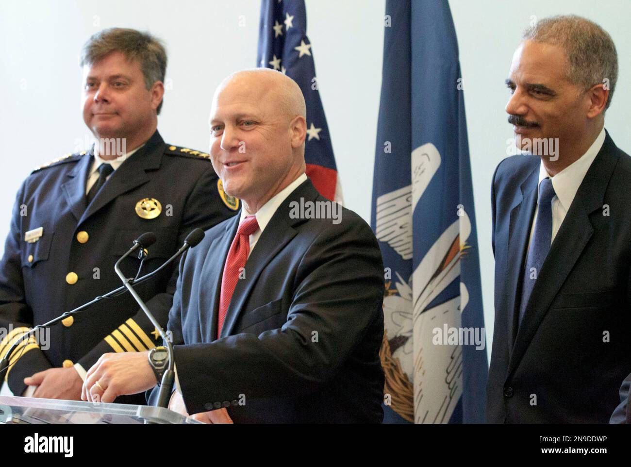 New Orleans Mayor Mitch Landrieu speaks next to Police Superintendent ...