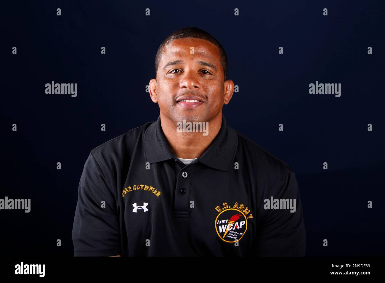 U.S. Army Greco-Roman wrestling coach Shon Lewis poses for his ...