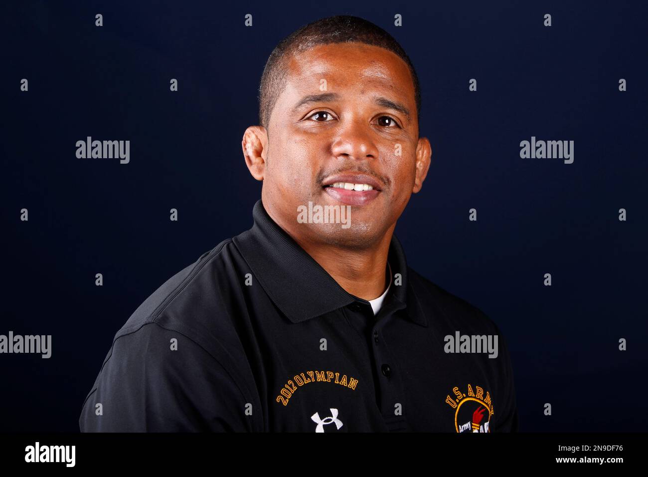 U.S. Army Greco-Roman wrestling coach Shon Lewis poses for his ...