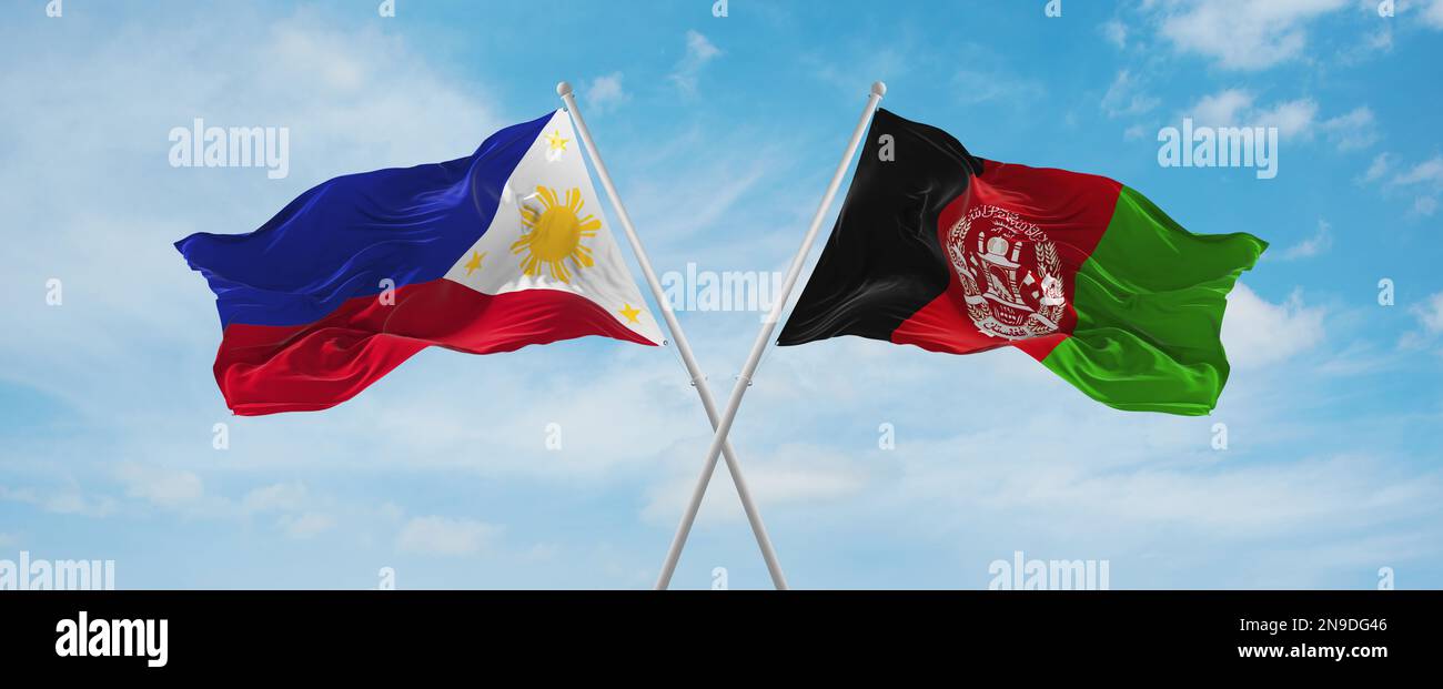 two crossed flags Afghanistan and Philippines waving in wind at cloudy sky. Concept of ...