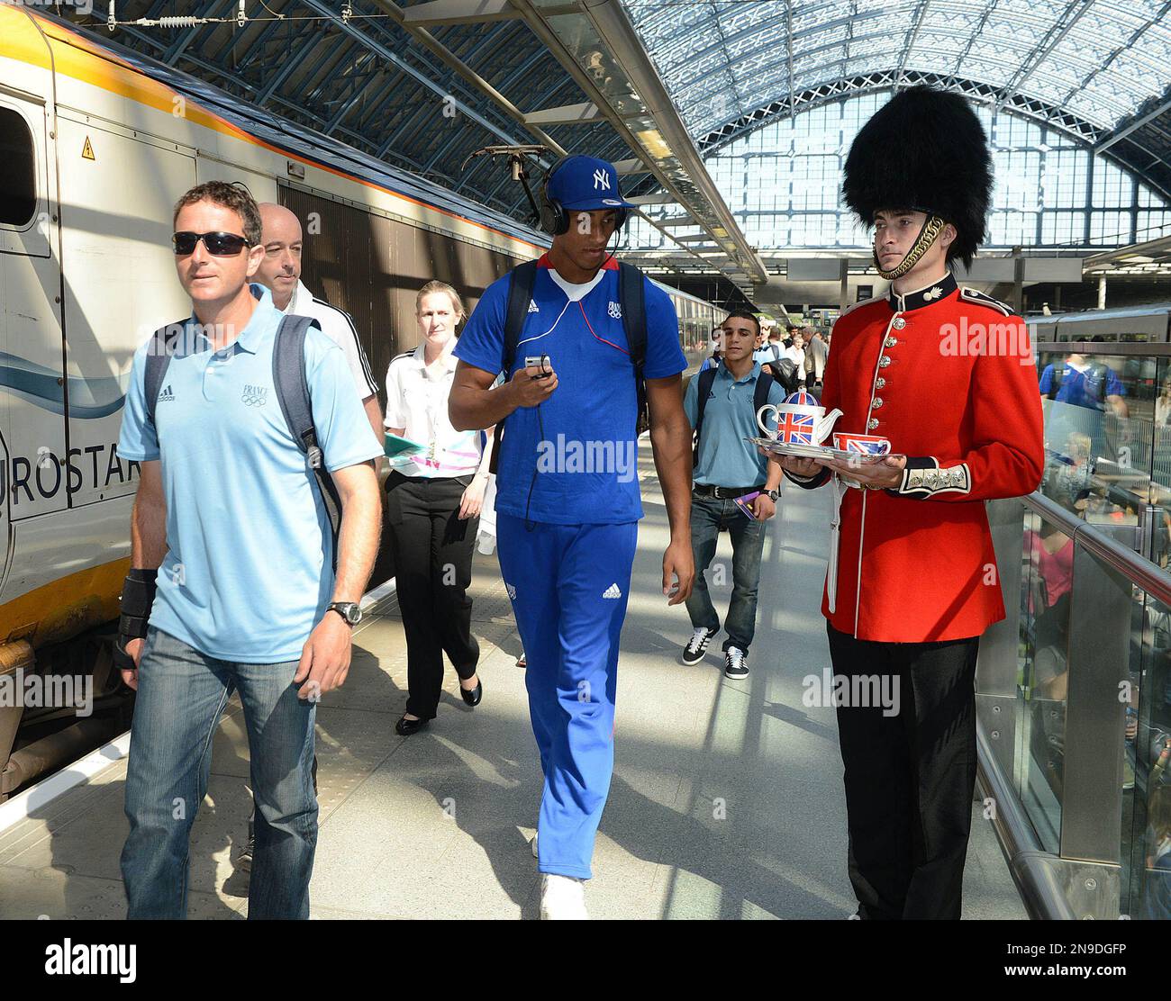 COMMERCIAL IMAGE - French boxer Tony Yoka, centre, and the French ...
