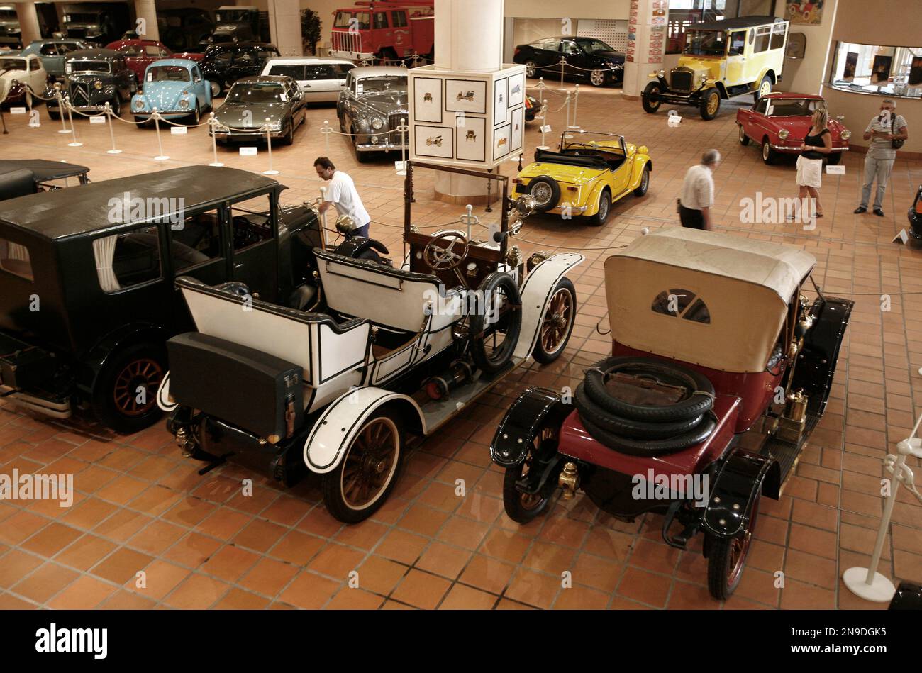 Visitors looks at the cars of the collection of Prince Albert II of ...