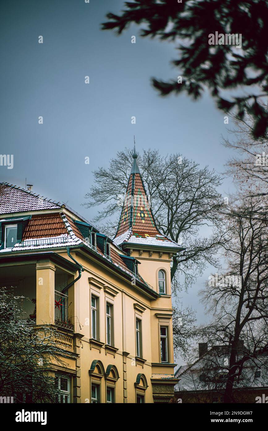 An architectural building with tower in winter Stock Photo - Alamy