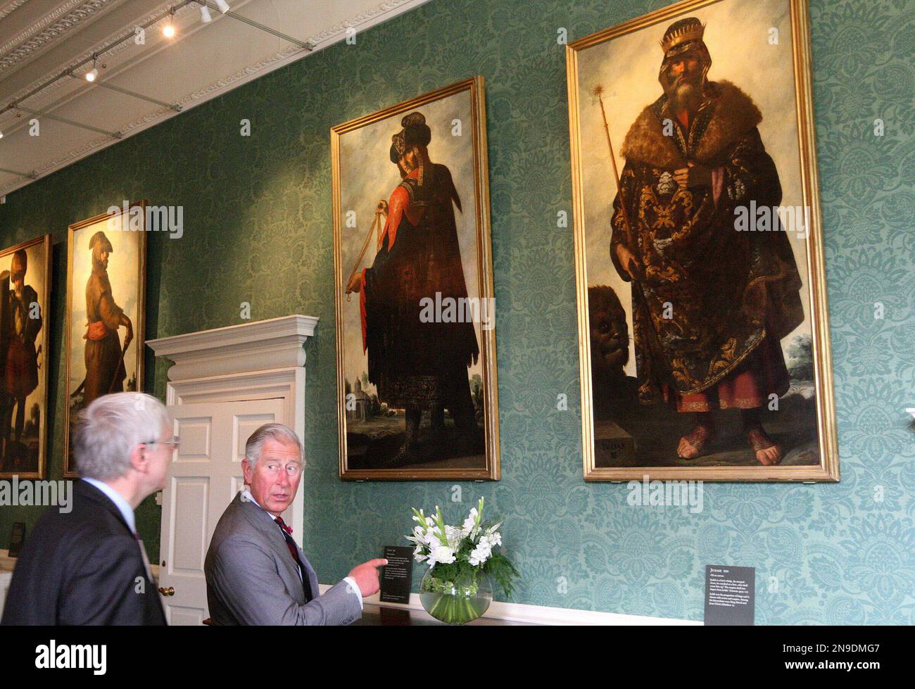 Britain's Prince Charles, right, is seen with Jonathan Ruffer, left, as ...