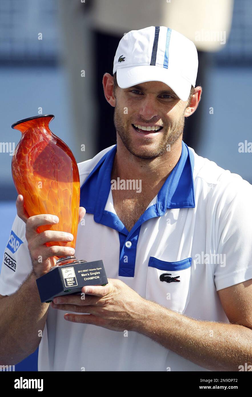 Andy Roddick poses with the trophy after winning the Atlanta Open ...