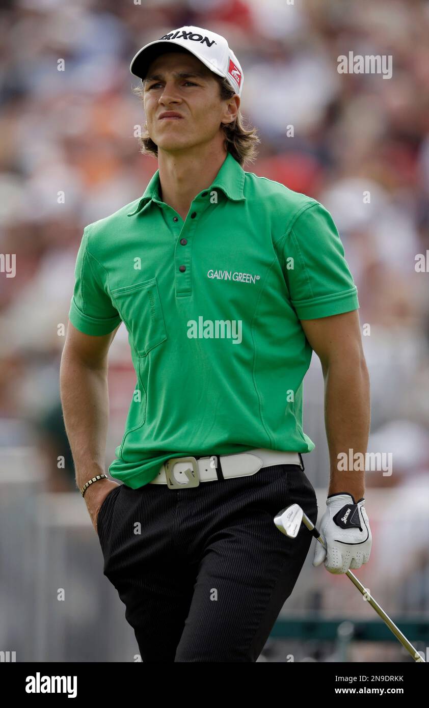 Thorbjorn Olesen of Denmark reacts after his shot off the fifth tee at ...