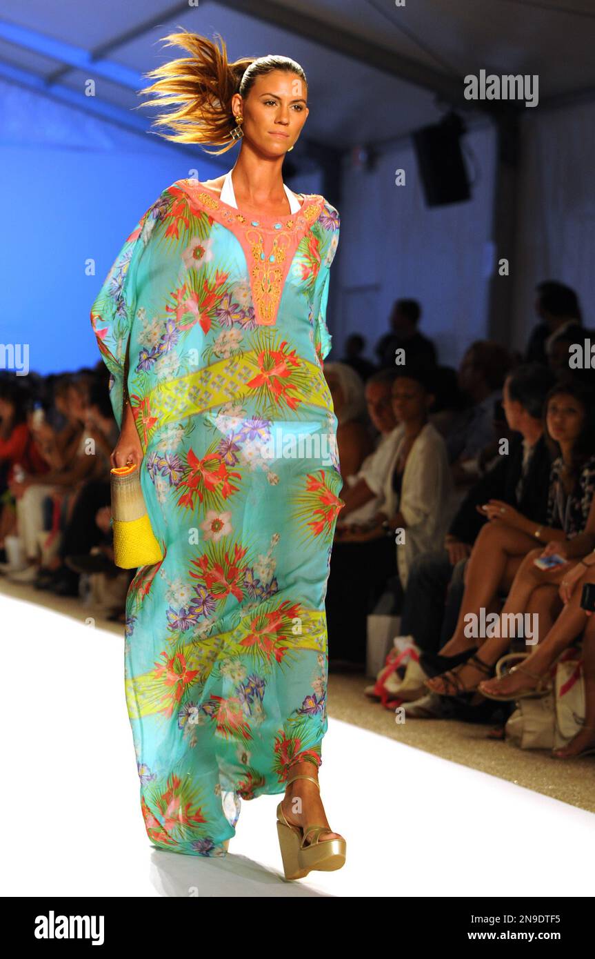 MIAMI, FL - JULY 21: A model walks the runway at the Cia Maritima show ...