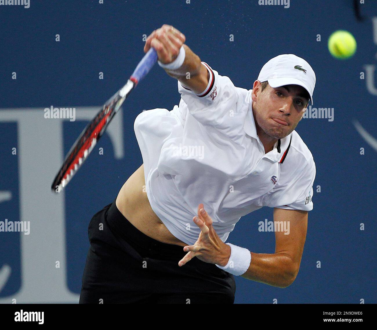 John Isner, of the United States, serves during a semifinal against ...