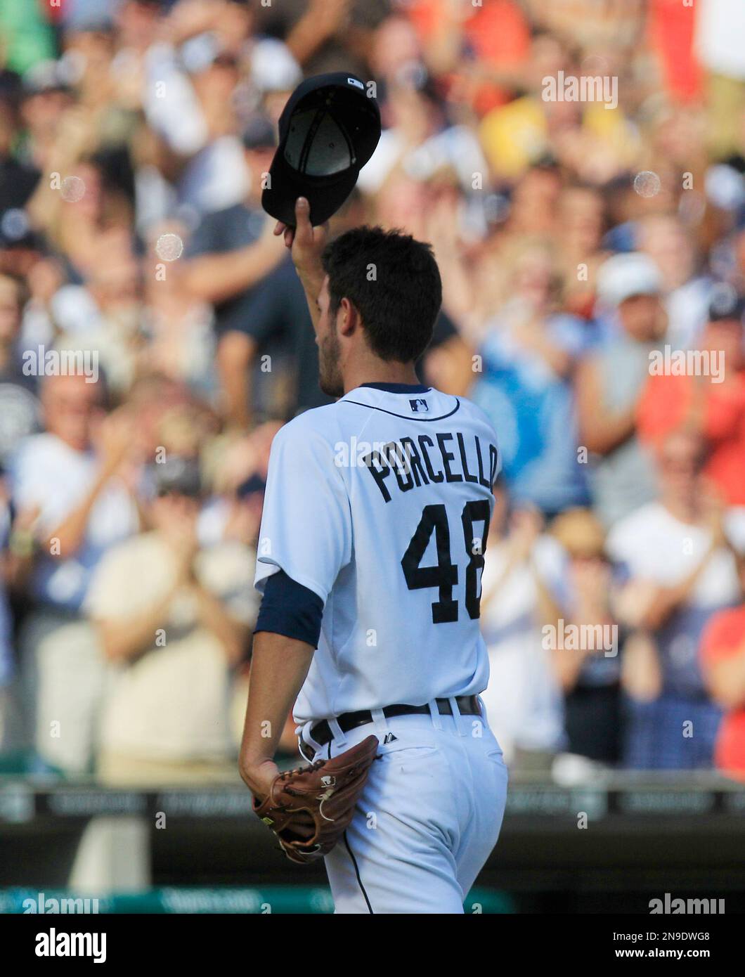 Detroit Tigers starting pitcher Rick Porcello (48) tips his hat after ...