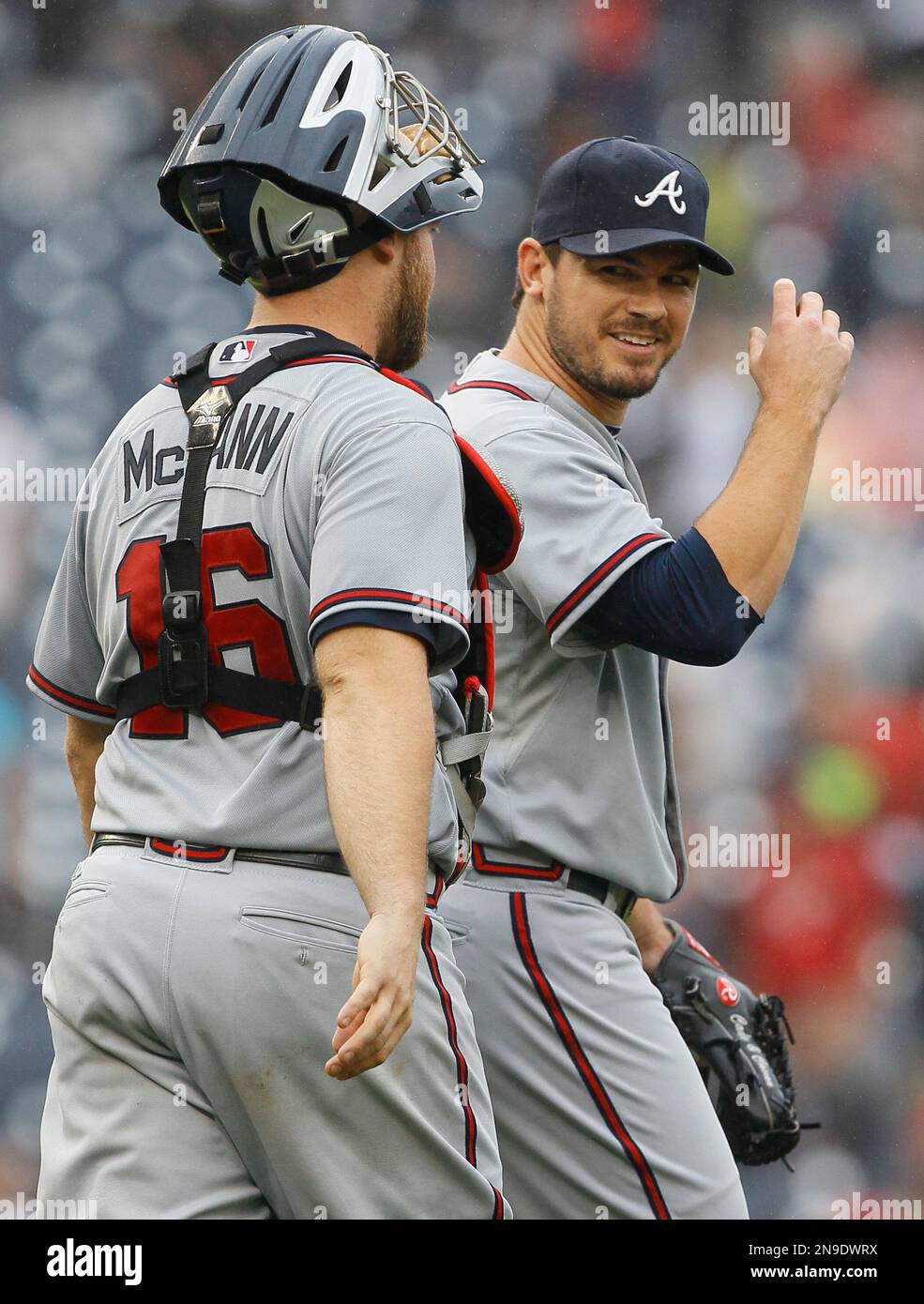 Atlanta Braves relief pitcher Chad Durbin (32) looks to catcher Brian McCann (16) after their 4 ...