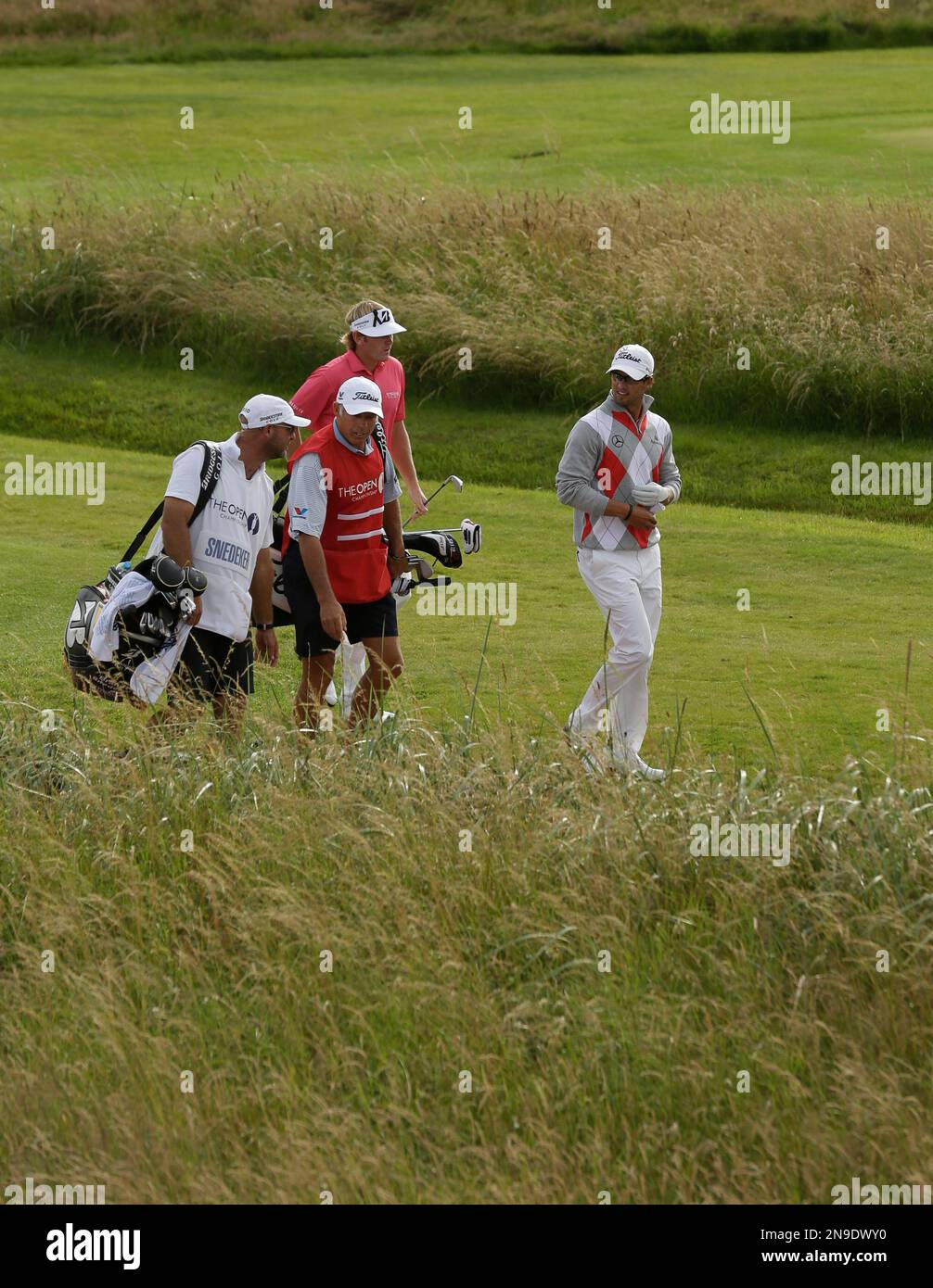 Adam Scott of Australia, right, Brandt Snedeker of the United States ...