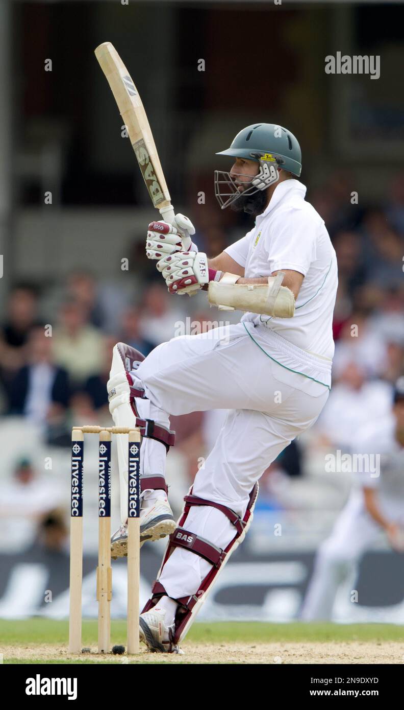 South Africa's Hashim Amla hits a ball from England's Stuart Broad ...