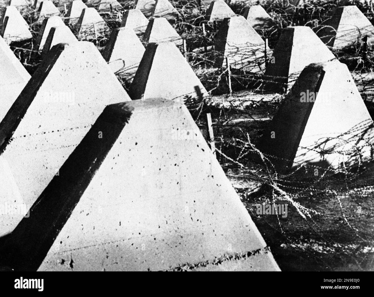 Tank traps built of reinforced concrete protect the German frontier ...